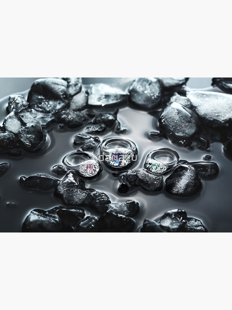 "Transparent icy rings made from glass in ice and water" Sticker for ...