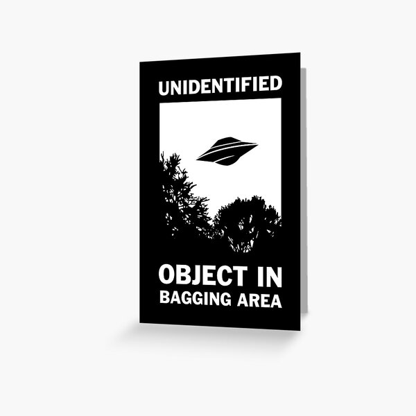 "Unidentified Object In Bagging Area" Greeting Card by dumbshirts ...