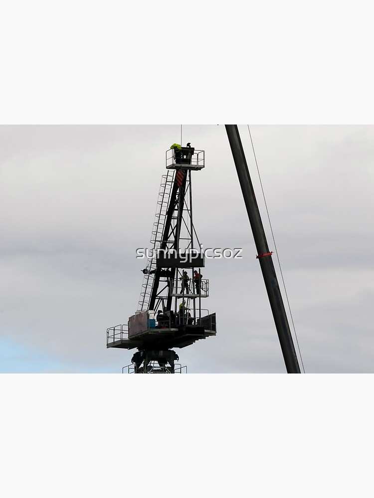 "Riggers assembling a Construction Crane on Multistory Units. May 5 ...