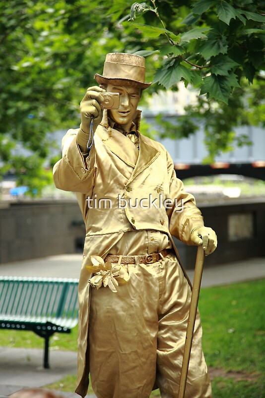 "gold man. southbank, melbourne" by tim buckley | bodhiimages | Redbubble