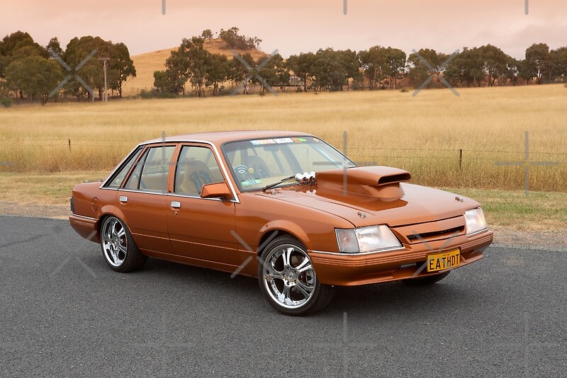 "Gold Holden VK Commodore" by John Jovic | Redbubble