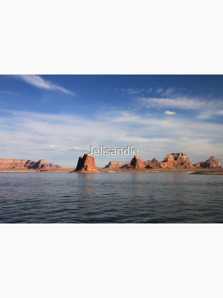 " Rock on the shore and blue sky: Lake Powell" Sticker by Jelisandie ...