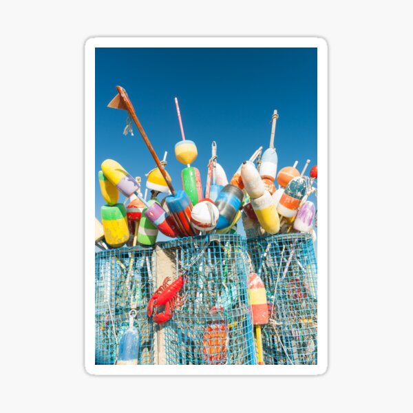 "Collection of colorful fishing or lobster trap buoys and markers at ...