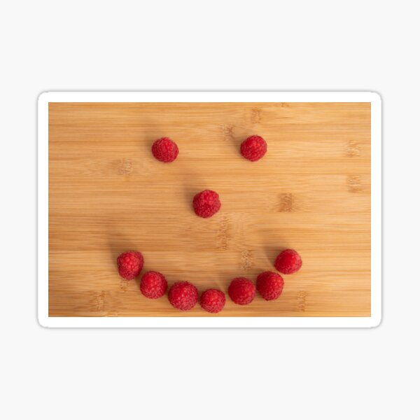 "Fresh red raspberry fruits aligned as smiley face photo" Sticker for ...