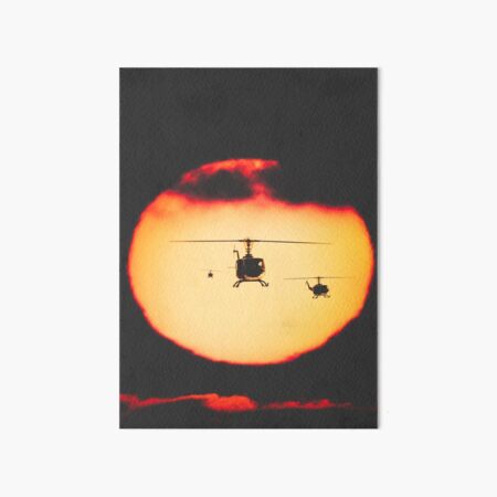 "Bell Huey Helicopters flying out of the sun in a scene reminiscent of ...