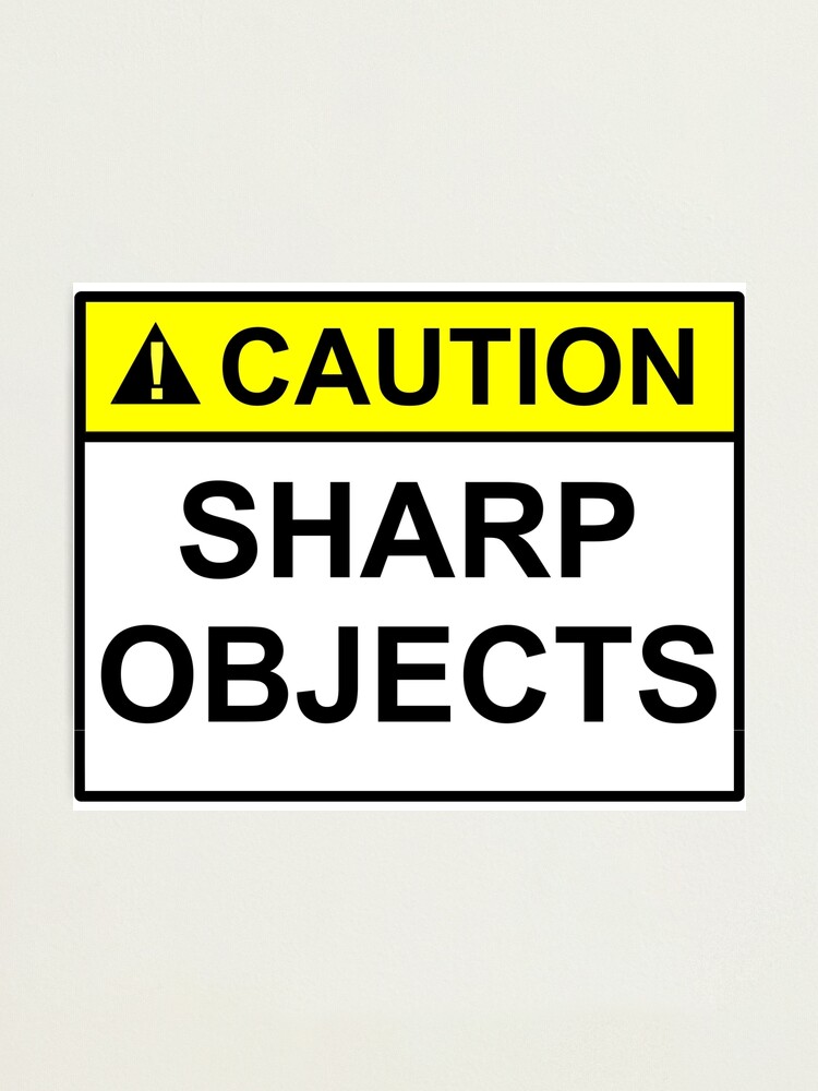 "CAUTION SHARP OBJECTS sign design art" Photographic Print for Sale by ...