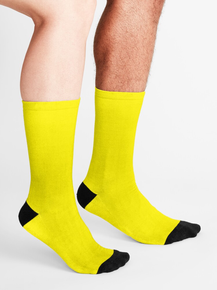Calcetines «Color plano amarillo» de jumpercat | Redbubble