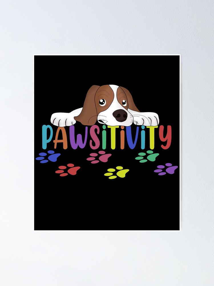 "Pawsitivity The cute little puppy is lying on the colorful word ...