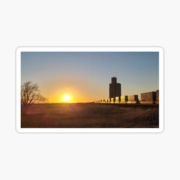 "Train Going into the Sunset Passing a Grain Elevator" Sticker for Sale ...