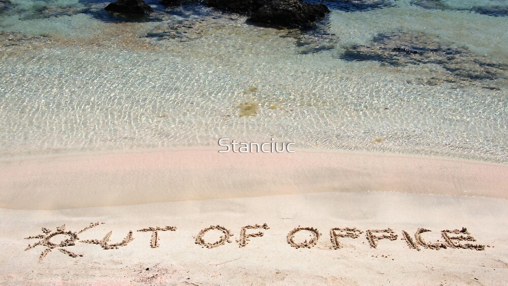 "OUT OF OFFICE written on sand on a beautiful beach, blue waves in ...