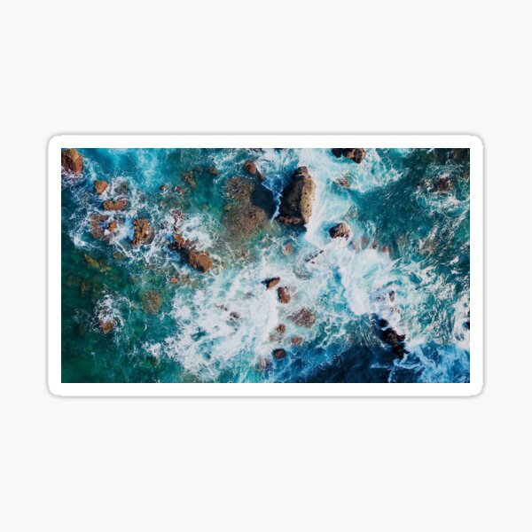 "blue ocean waves crashing on rocks sea shore beach" Sticker for Sale ...