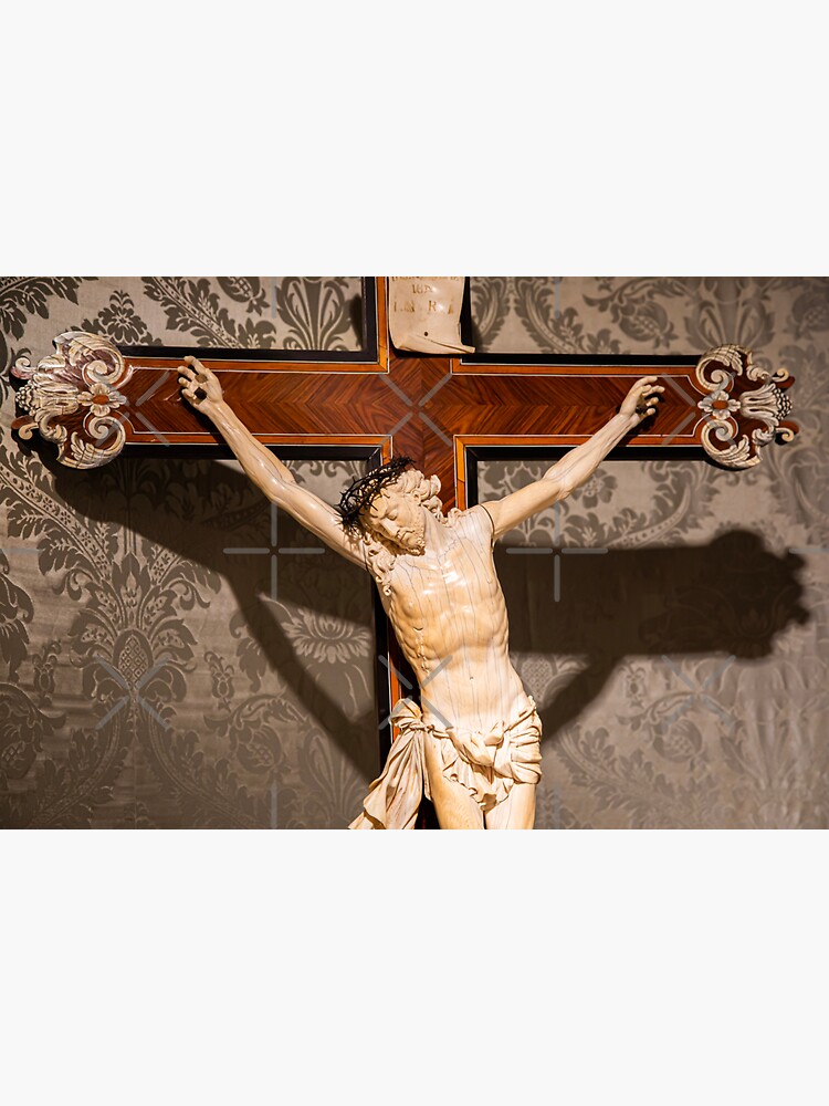 "Old crucifix made of wood and ivory. Jesus Christ symbol of resurrection and life after the ...