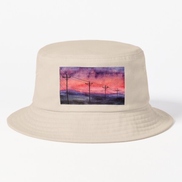 "Roadside sunset manmade vs nature" Bucket Hat for Sale by Wieskunde ...