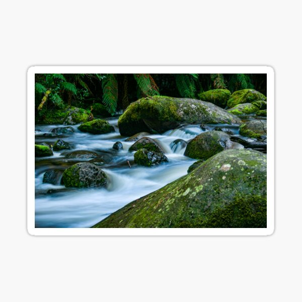 "Close up of a river winding between the rocks and boulders" Sticker ...