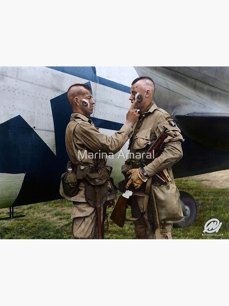 "Filthy Thirteen member Clarence Ware applies war paint to Charles ...