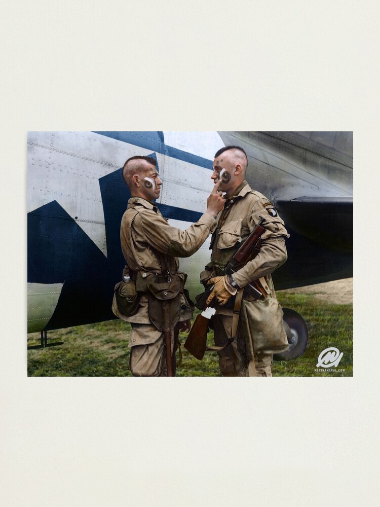 "Filthy Thirteen member Clarence Ware applies war paint to Charles ...