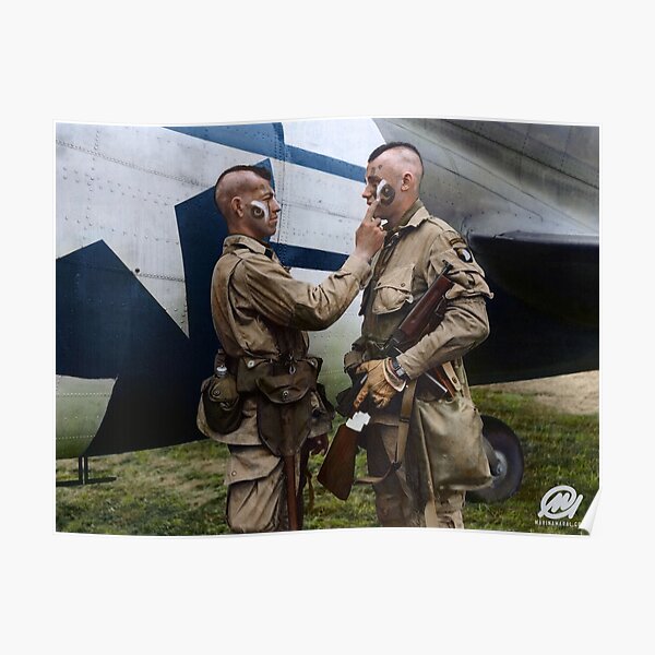 "Filthy Thirteen member Clarence Ware applies war paint to Charles ...