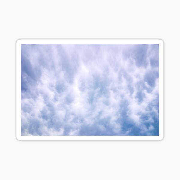 "Ominous cloud patterns in an overcast sky" Sticker for Sale by James ...