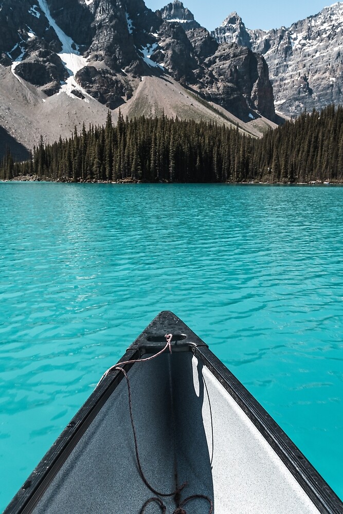 "canoeing through some of the bluest water in the world at moraine lake ...