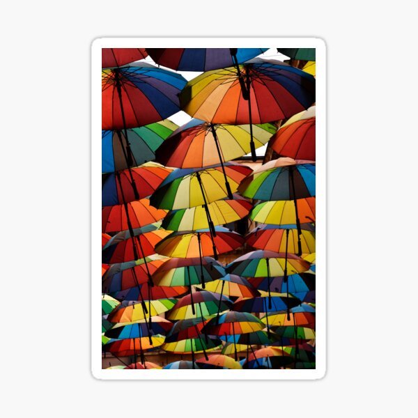 "Umbrellas in rainbow colors | Travel photography" Sticker for Sale by ...