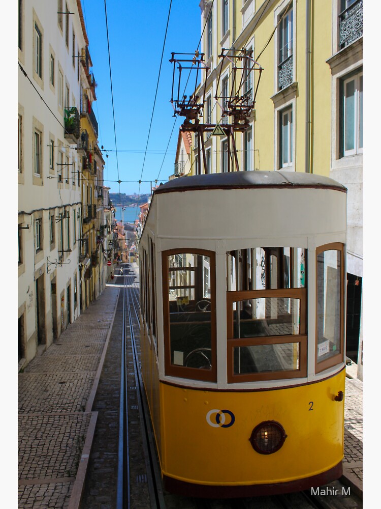 "Yellow vintage tram on the street in Lisbon" Sticker for Sale by ...