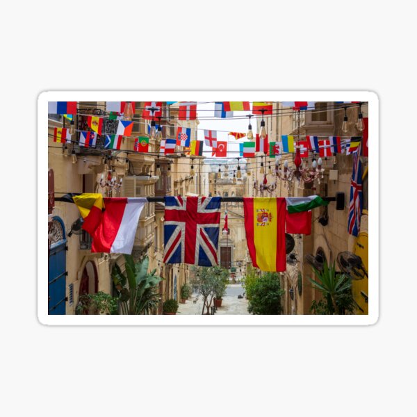 "Flags of various countries hanging over street" Sticker for Sale by ...