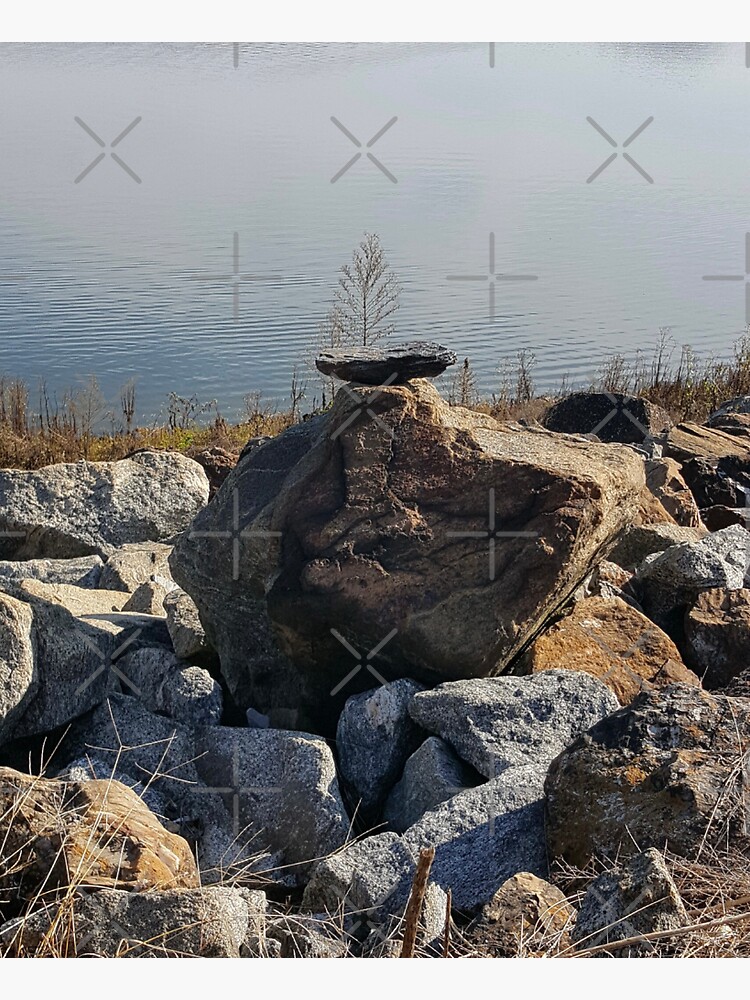 "Rock stacking by lake" Sticker for Sale by mickeygo | Redbubble