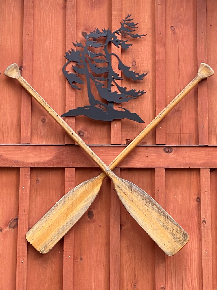 "Wooden Paddle Wall Art on a Cabin" Sticker for Sale by ldevine | Redbubble