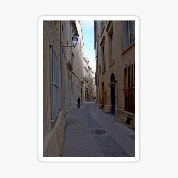 "Alleyway of old stone buildings, Montpellier, France" Sticker for Sale ...