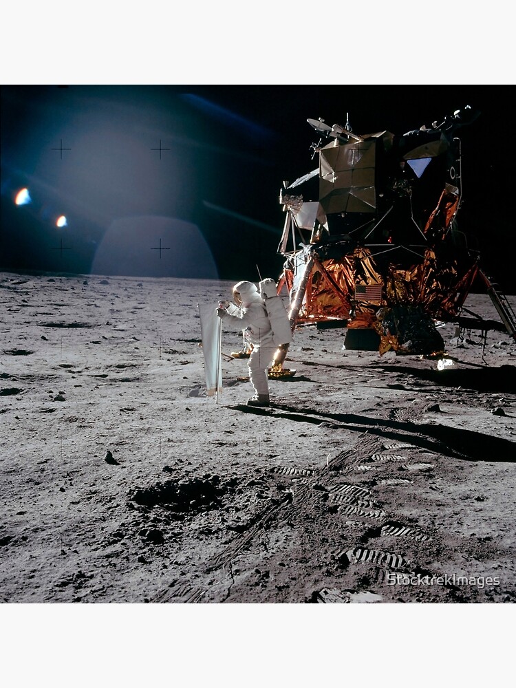 "An astronaut deploying the Solar Wind Collector during an Apollo 11 ...