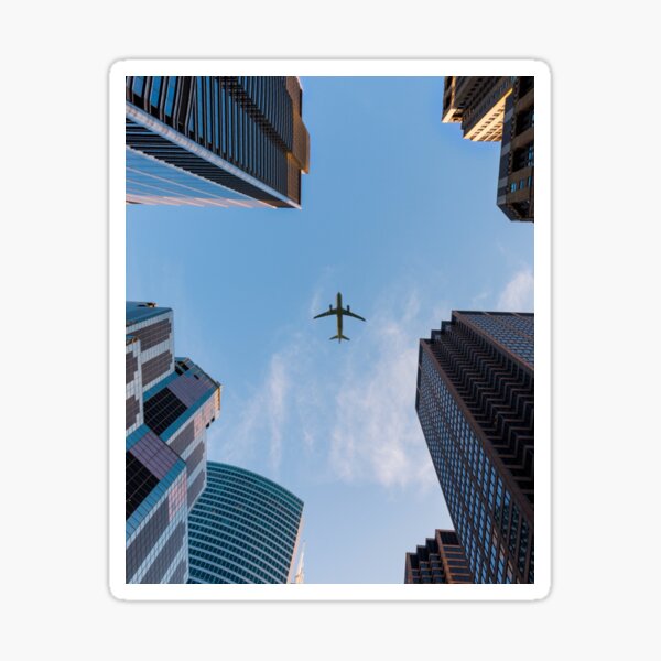 "Quilted Patterns, A City, A Plane Flying Over Skyscrapers" Sticker for ...