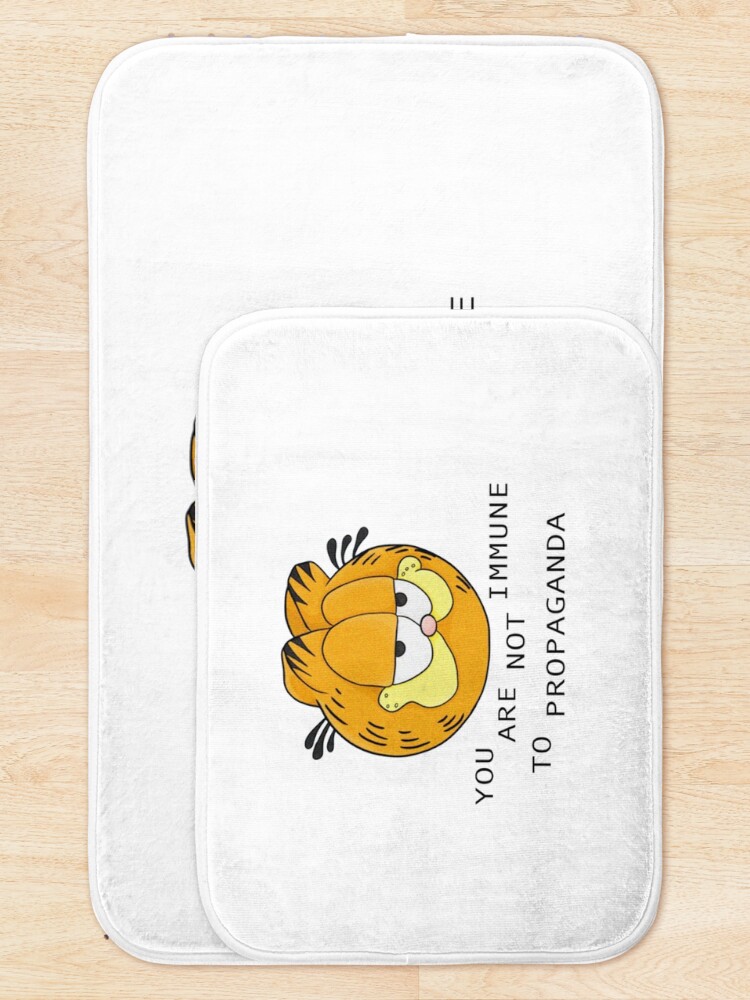 You are not immune to propaganda - garfield Bath Mat sold by Zhen L ...