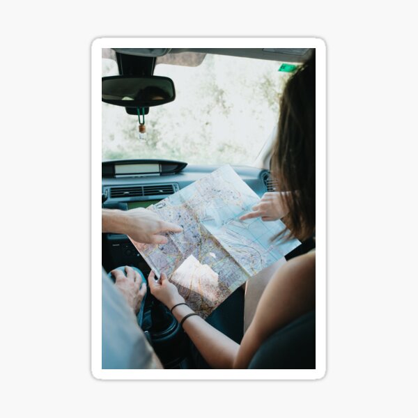 "People holding a map inside of a car" Sticker by autoisthemotive ...