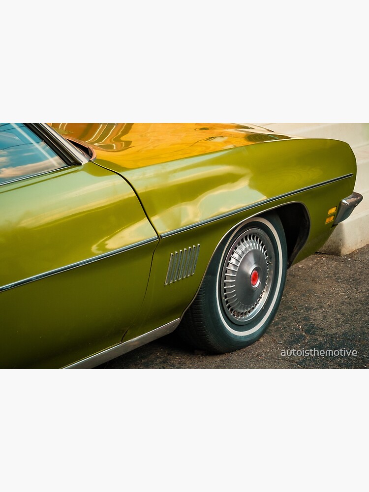 "The front side of a classic olive green car" Sticker by ...