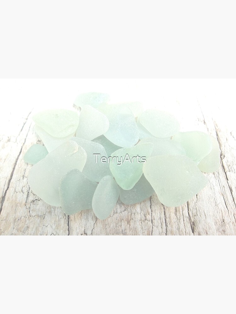 Póster «Vidrio de mar turquesa pálido costero sobre madera clara ...