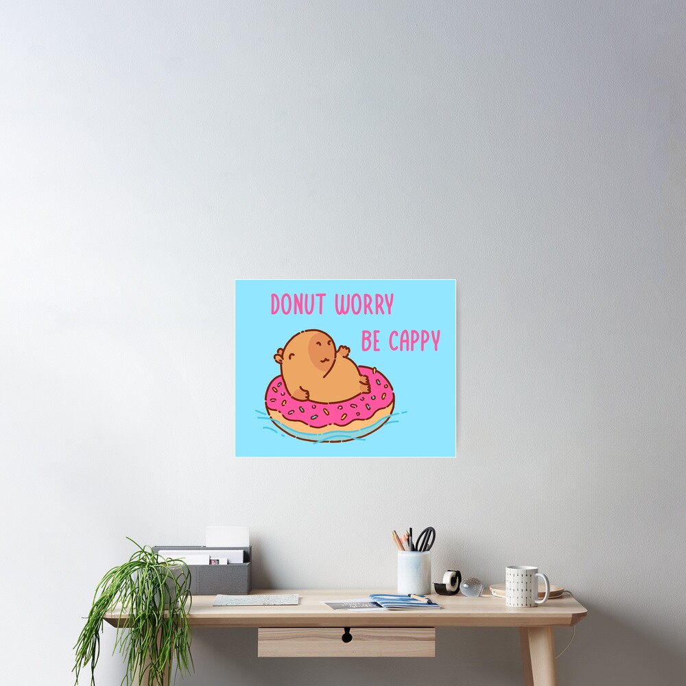 "Capybara floating in a donut floater, donut worry be cappy" Poster by ...
