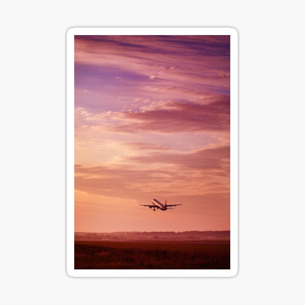 "Airplane taking off at the sunset sky" Sticker by dariazu | Redbubble