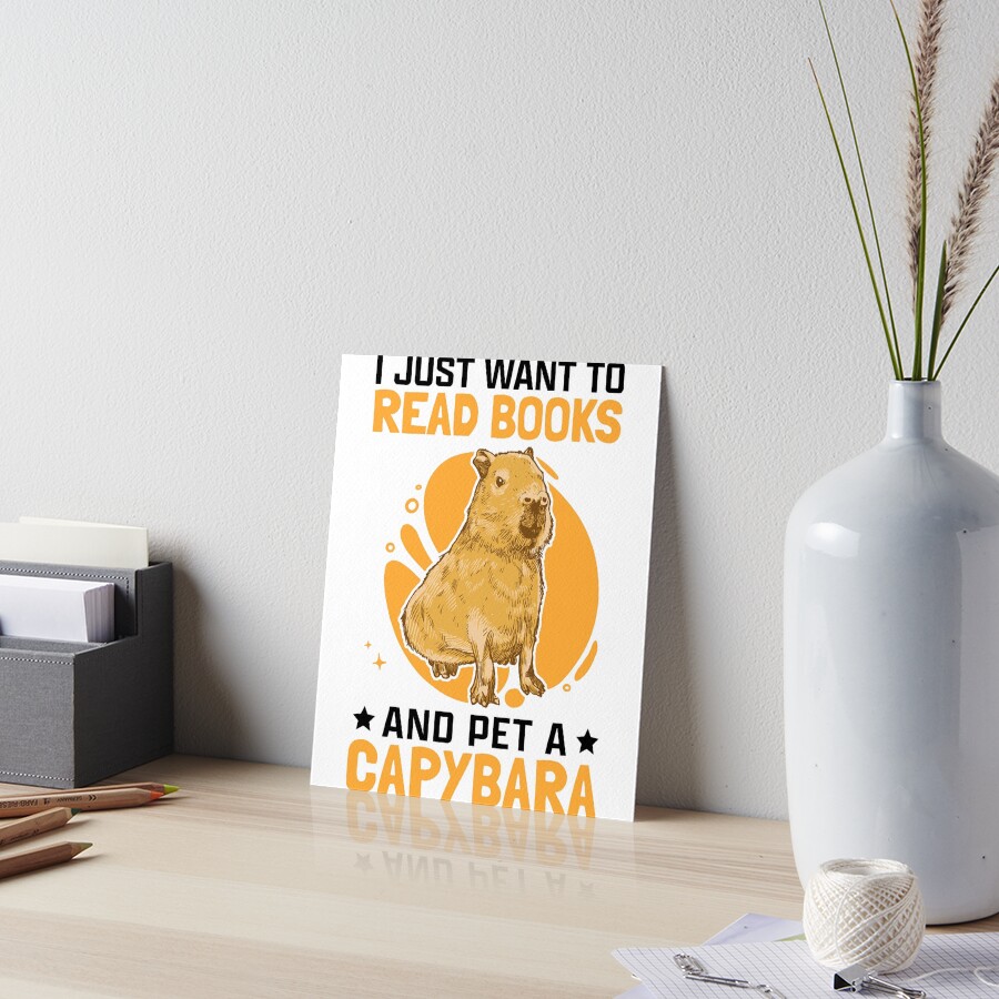 "Petting capybaras and reading books Capybara" Art Board Print by ...