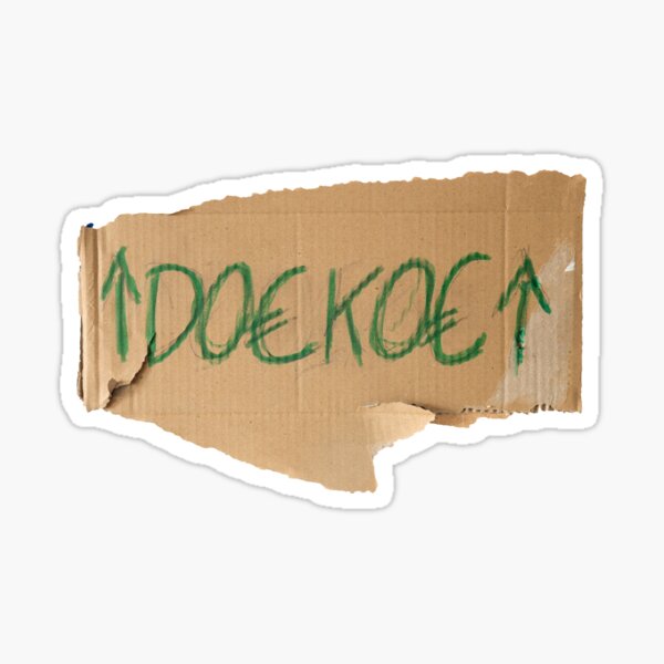"Cardboard protest board with the word doekoe and arrows pointing ...