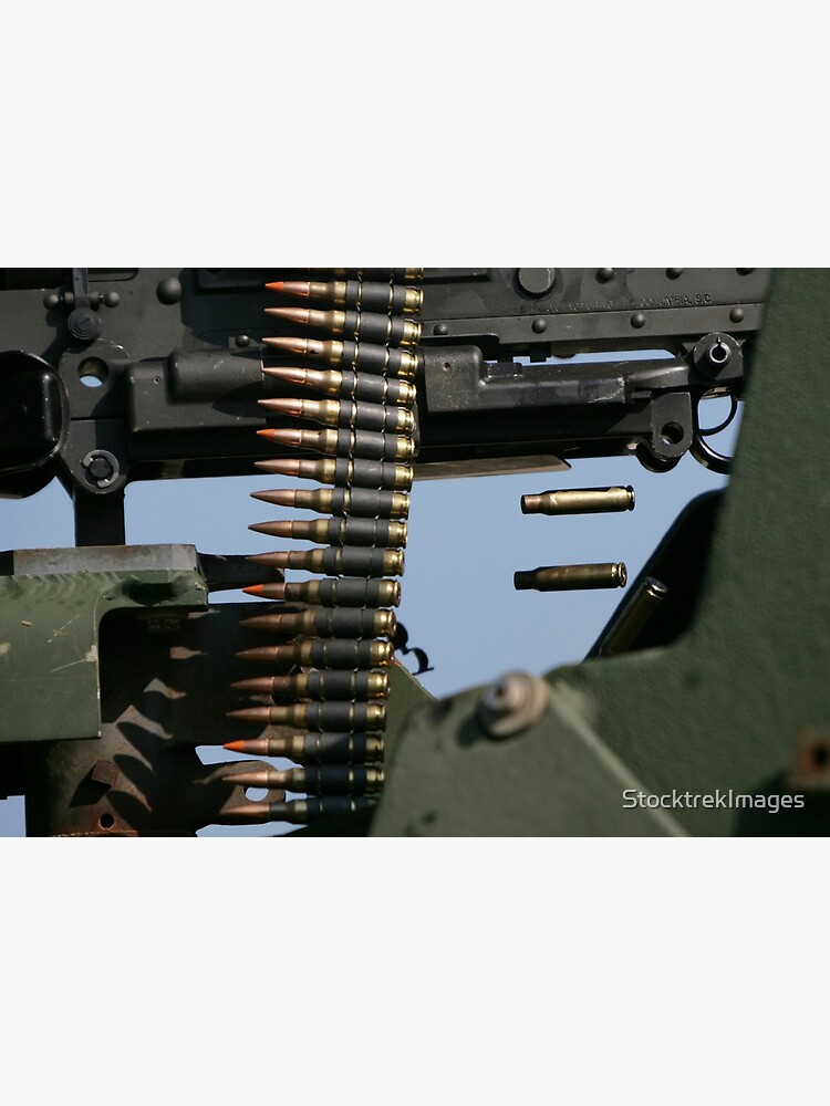 "Expended brass falls from a machine gun." Poster for Sale by ...