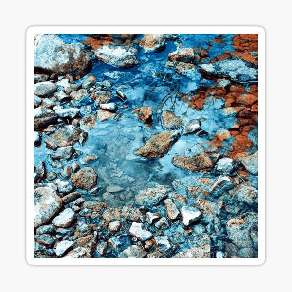 "River stones in blue water" Sticker for Sale by Photostacia | Redbubble