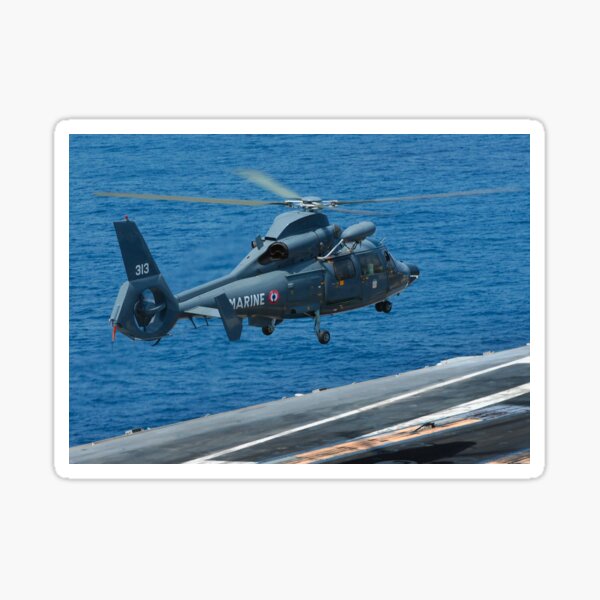 "A French Dolphin 35F helicopter takes off from the flight deck of USS ...