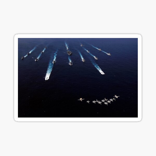 "U.S. Navy aircraft fly over a formation of U.S. and Japanese ships ...