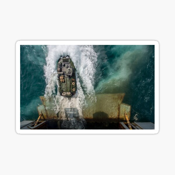 "An amphibious assault vehicle exits the well deck of USS Bataan ...