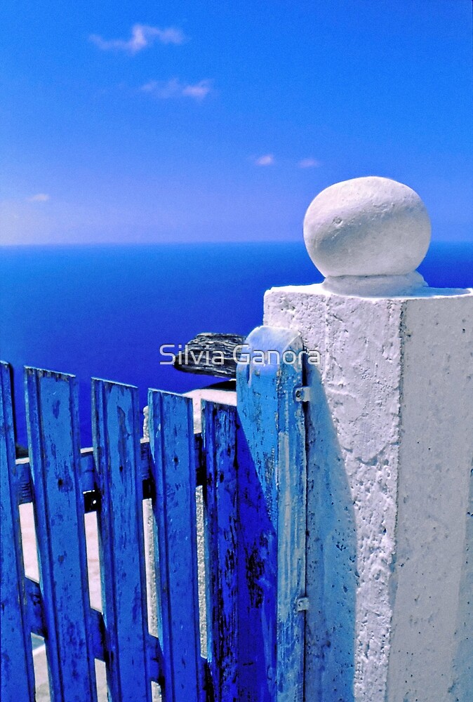 "Greek blue gate with wandering clouds" by Silvia Ganora | Redbubble
