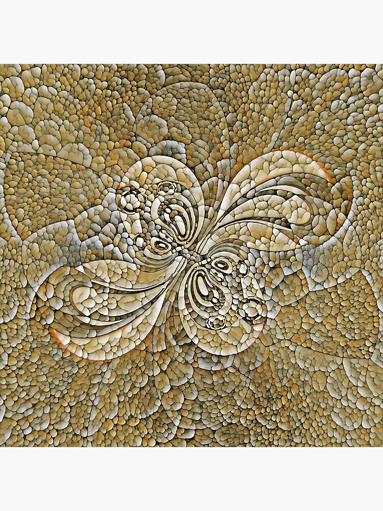 "creative cyclone style design from natural gold coloured beach pebbles ...