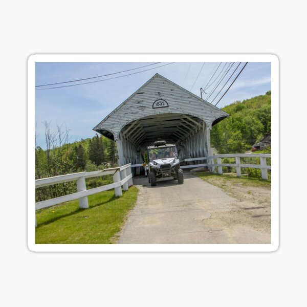 "A wheeler crossing through a covered bridge " Sticker for Sale by ...