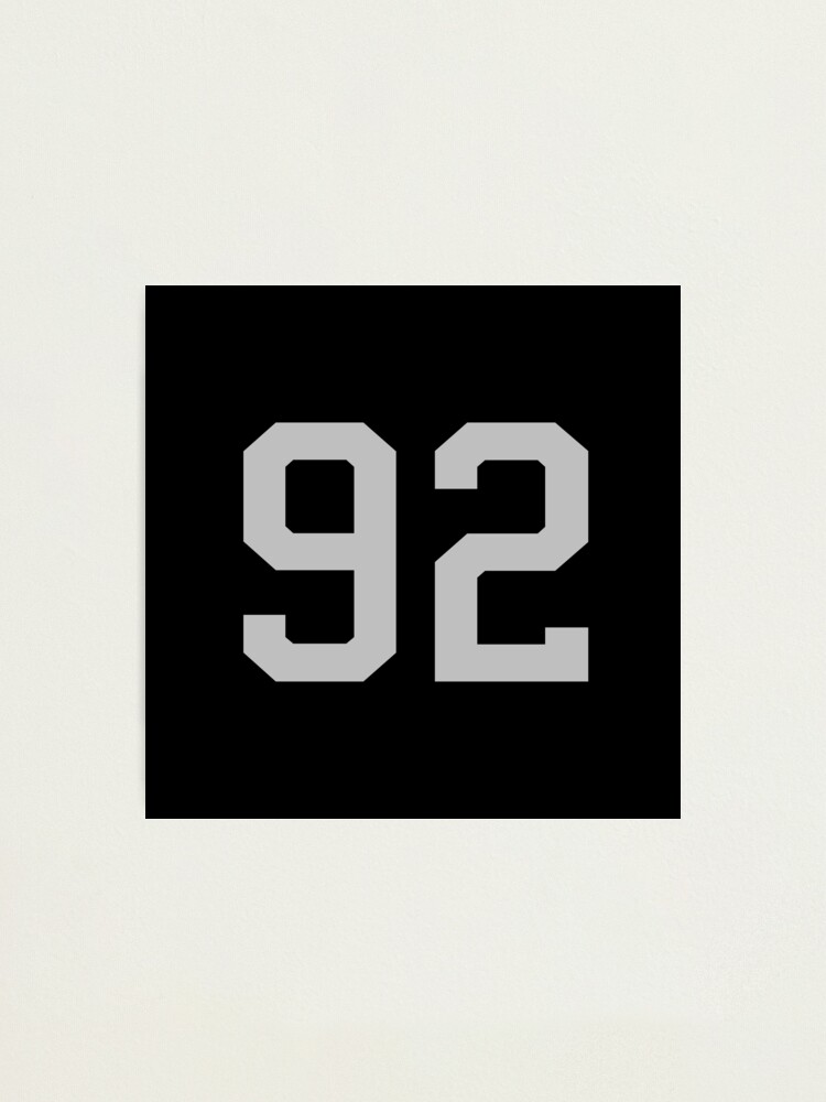 Lámina fotográfica «Número 92, camiseta deportiva gris sobre negra ...