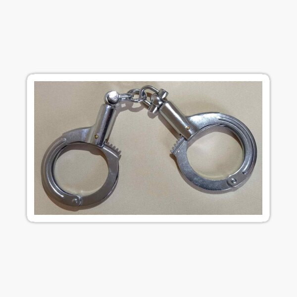 "Chinese handcuffs high security" Sticker for Sale by morthawt | Redbubble