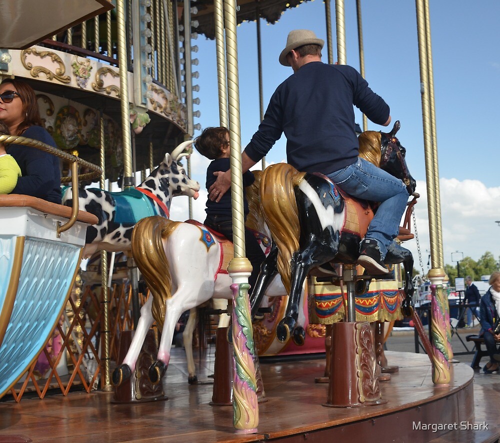 "carousel riders in France" by Margaret Shark | Redbubble